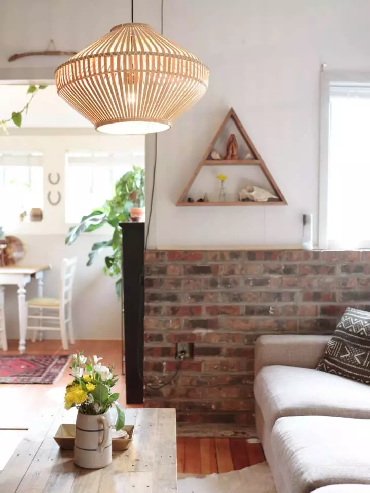 Brick wall bohemian style living room corner